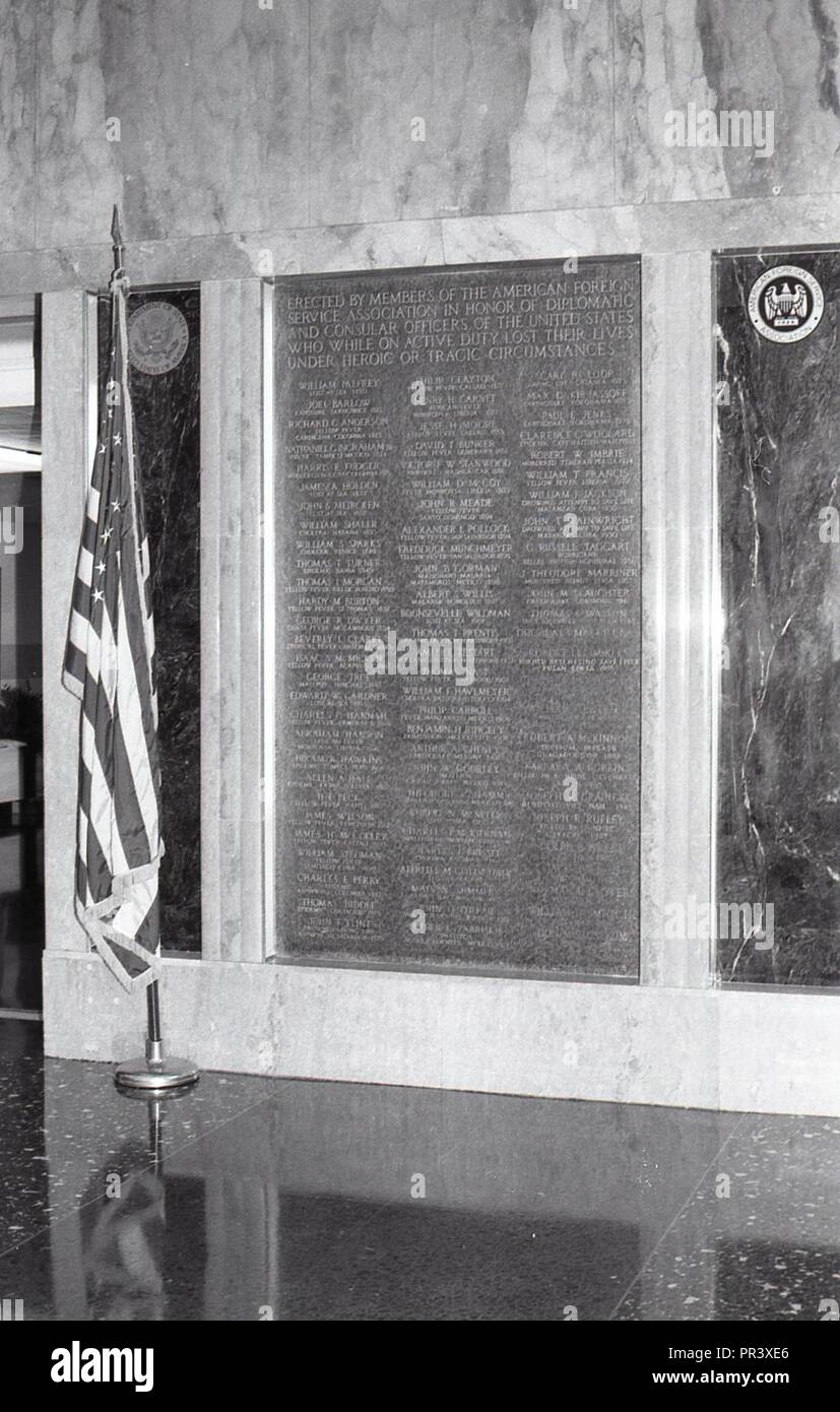 A USA FLAG NEXT TO A TRIBUTE TO AMERICAN FOREIGN SERVICE WORKERS ON THE ...