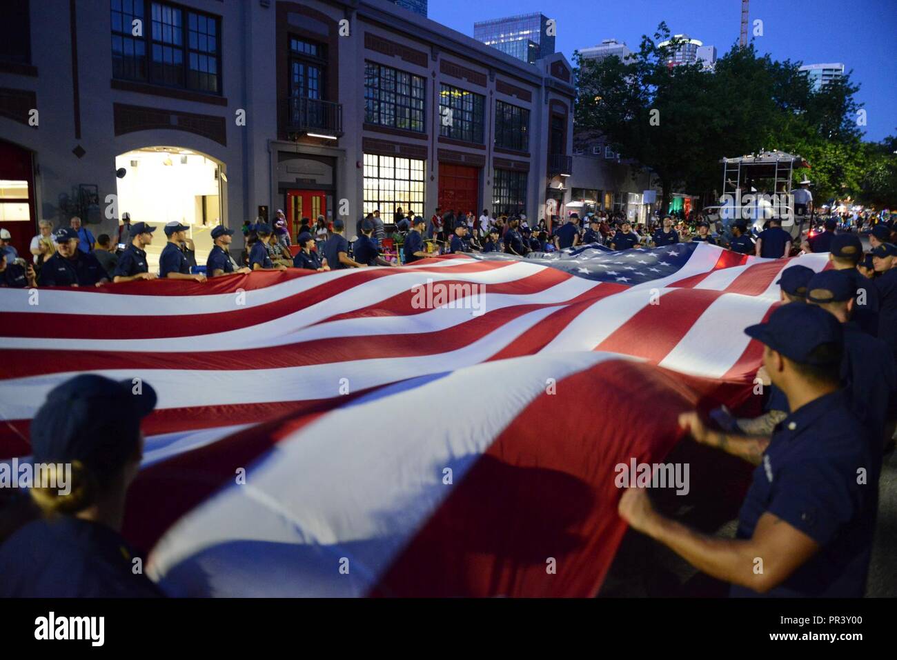 Coast Guardsmen and Coast Guard Auxiliary members, from various units ...
