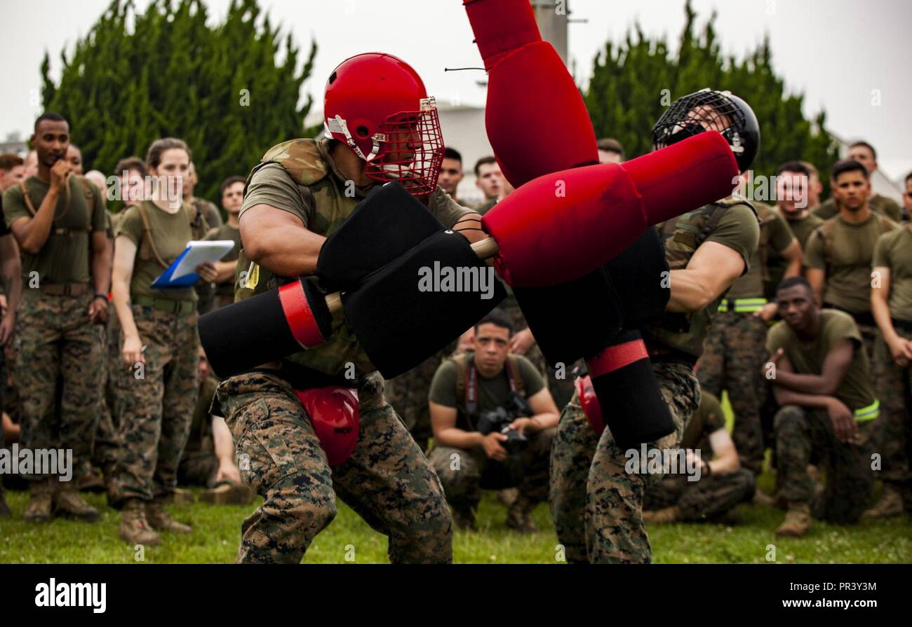 U.S. Marines and Sailors with Headquarters and Headquarters Squadron (H&HS) participate in pugil ...