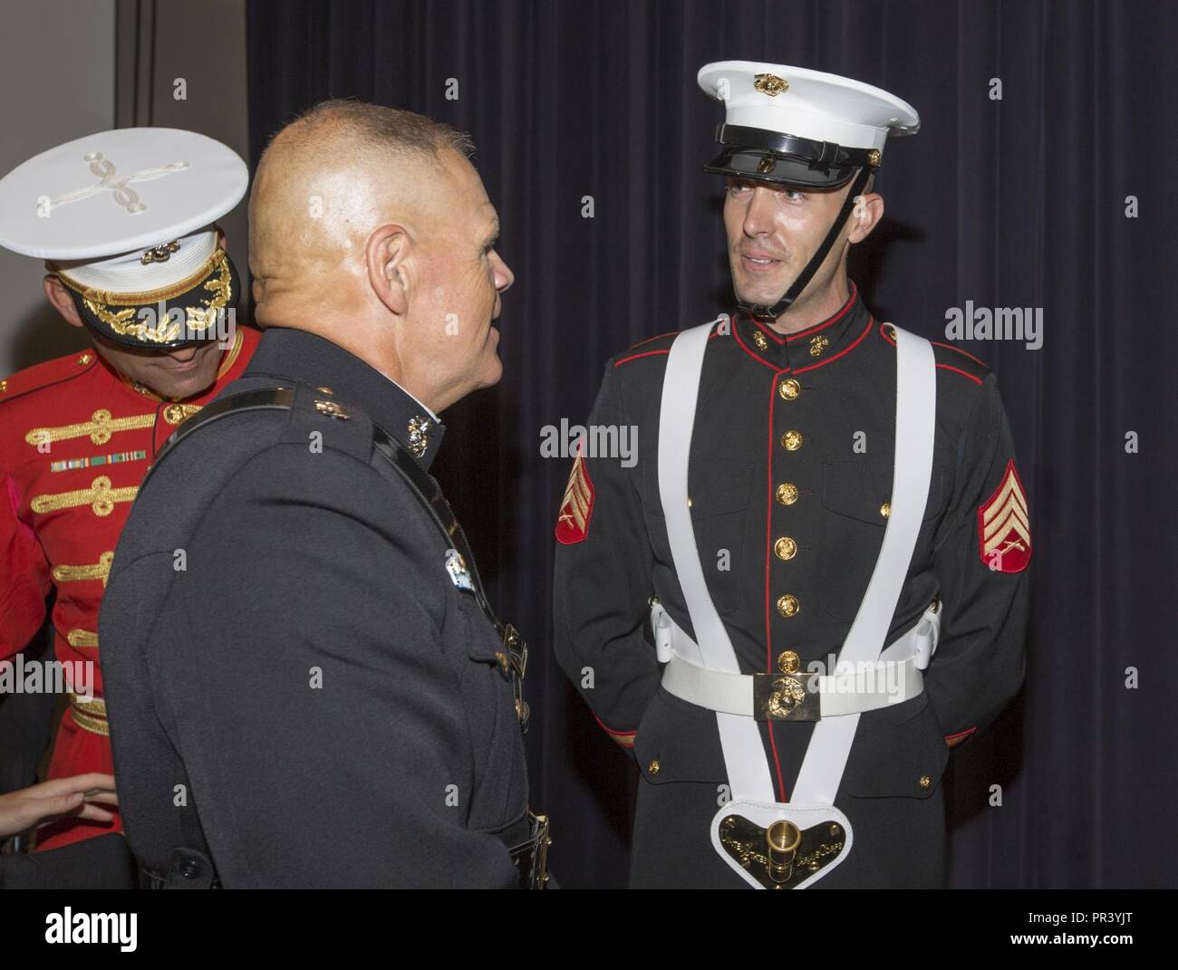 Commandant of the Marine Corps Gen. Robert B. Neller, left, speaks with ...