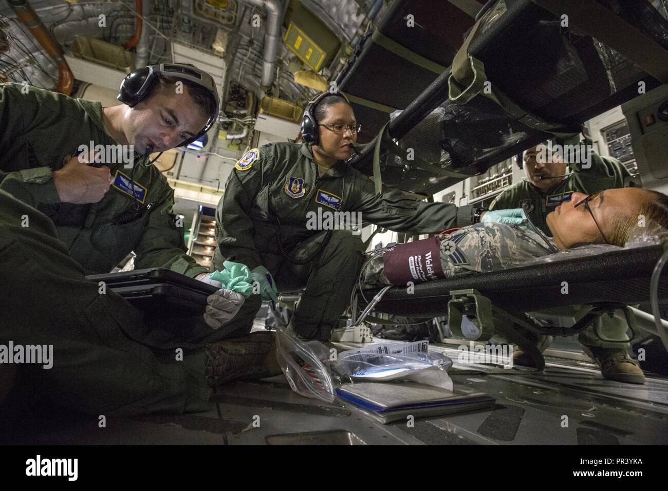 U.S. Air Force Tech. Sgt. Rocco L. Morello, left, aeromedical ...
