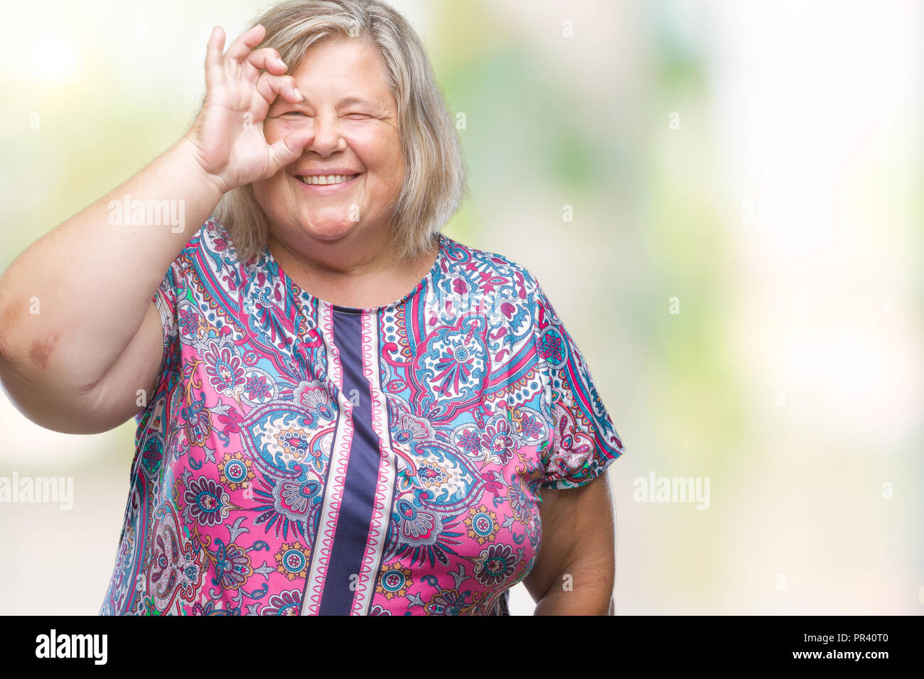 Senior plus size caucasian woman over isolated background doing ok ...