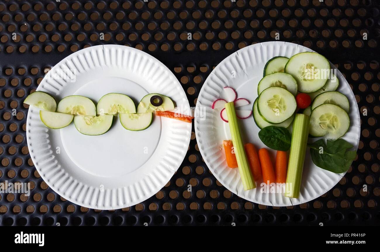Children learned how to make eating fun by making vegetable snakes and ...