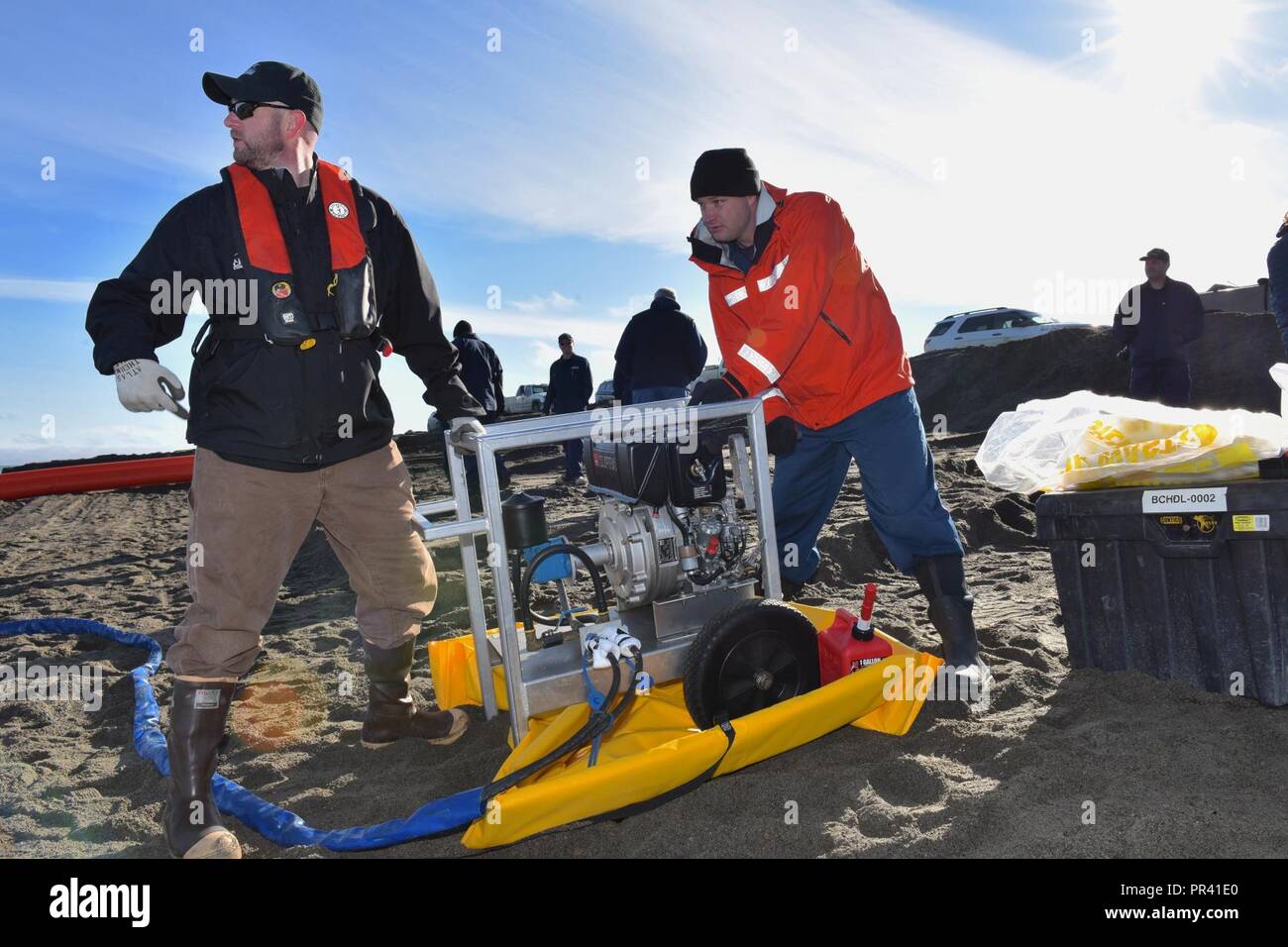 A member of the Coast Guard National Strike Force Pacific Strike Team ...