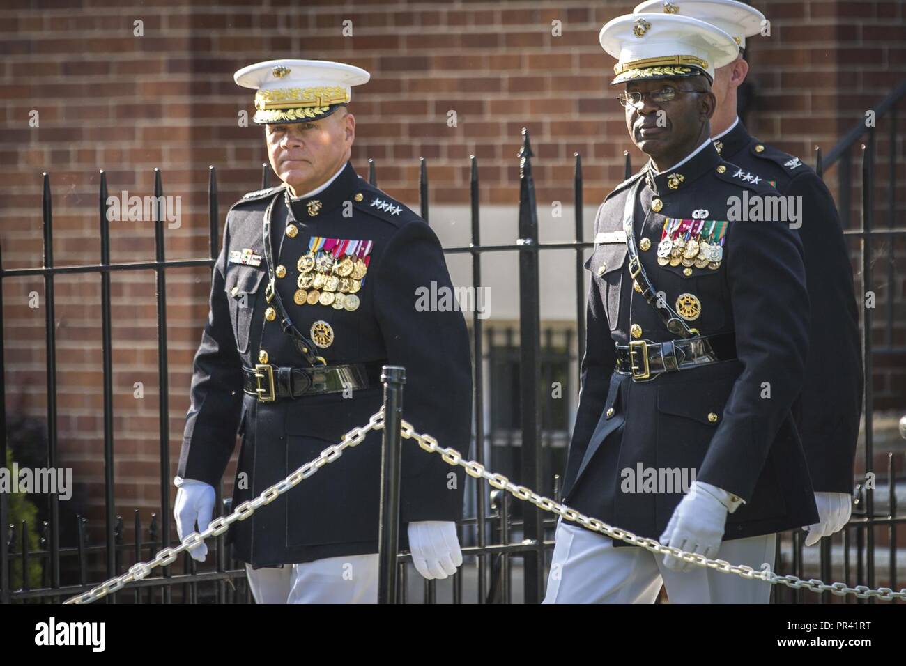 Commandant of the Marine Corps Gen. Robert B. Neller, left, walks with ...
