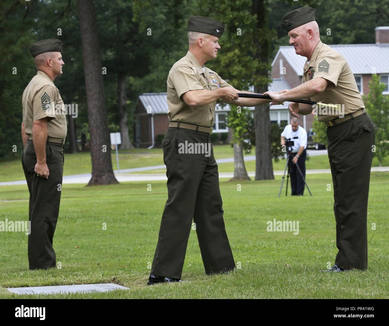 Col. Todd Ferry passes the non-commissioned officer sword of office to ...