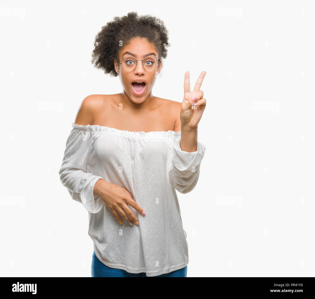 Young afro american woman wearing glasses over isolated background ...