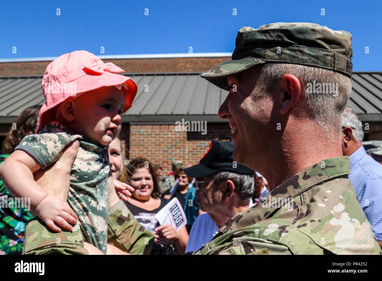 A Soldier with Headquarters, 37th Infantry Brigade Combat Team holds ...