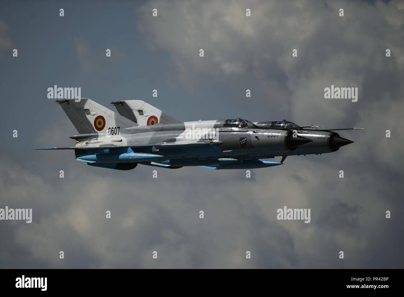 Two Romanian air force Mikoyan-Gurevich MiG-21 aircraft fly in ...