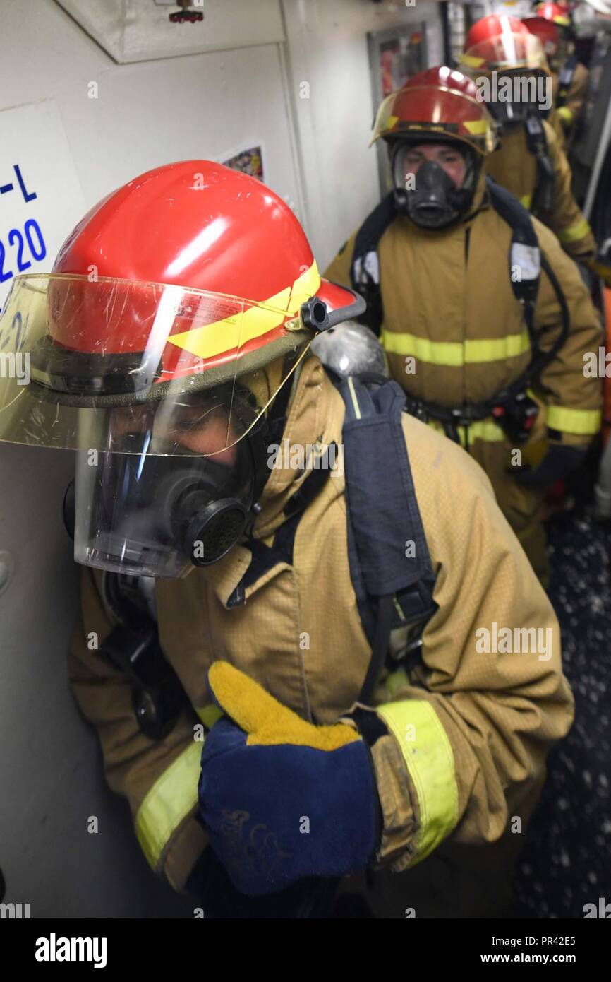 OCEAN (Aug. 2, 2017) An overhaul team prepares to enter an engine room ...