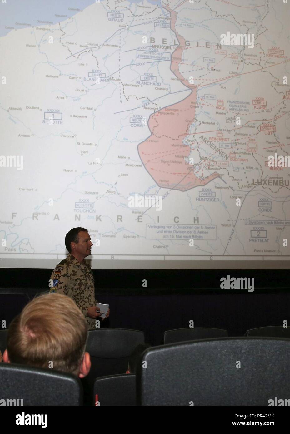Lt. Col. Elmar Henschen, of the German Army, discusses the movements of ...