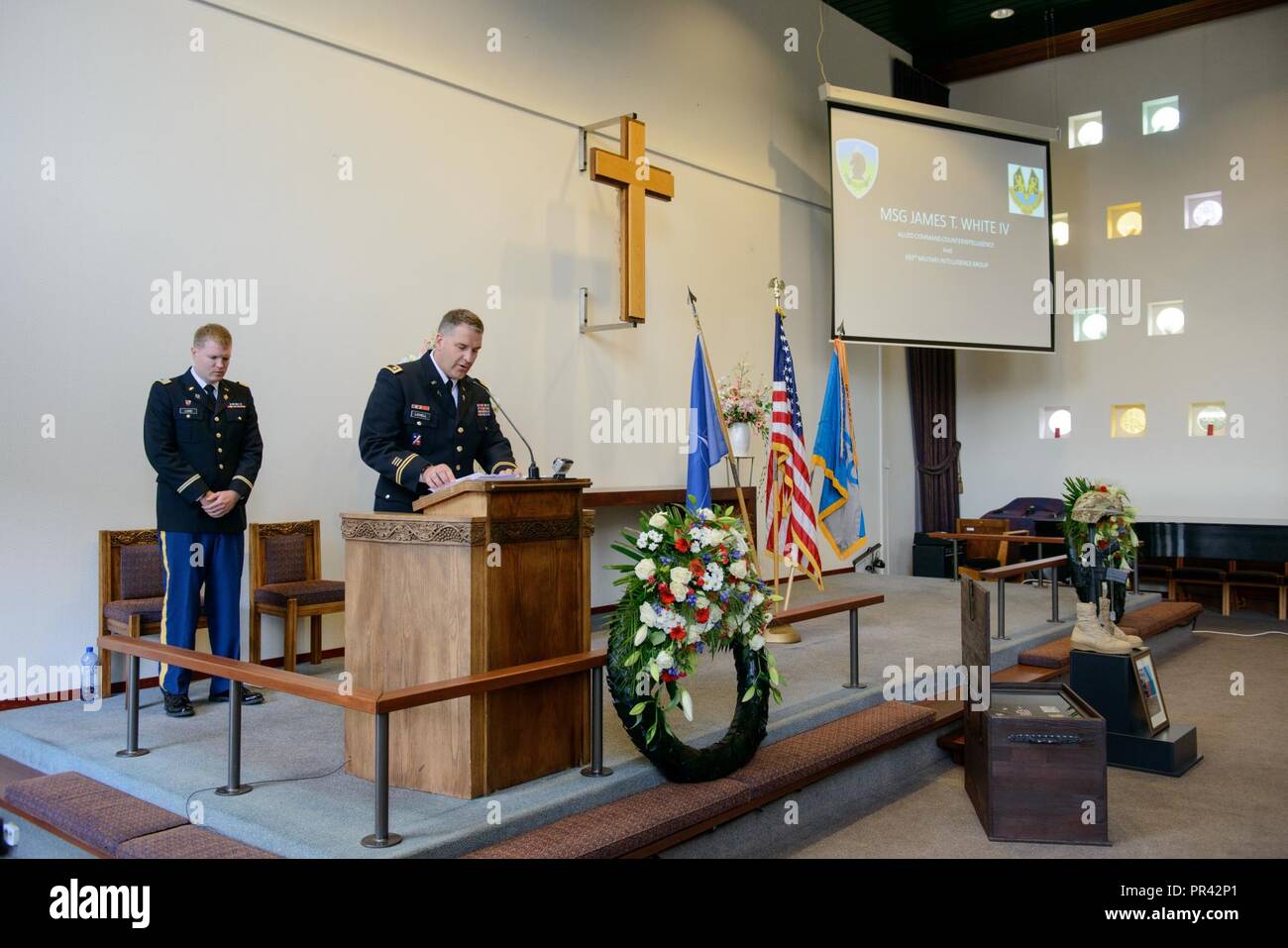 U.S. Army Chaplain Lt. Col. William Lovell gives the invocation during ...