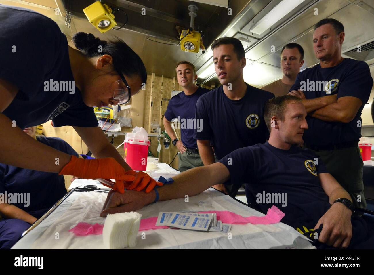 Joint coast guard navy dive team hi-res stock photography and images ...