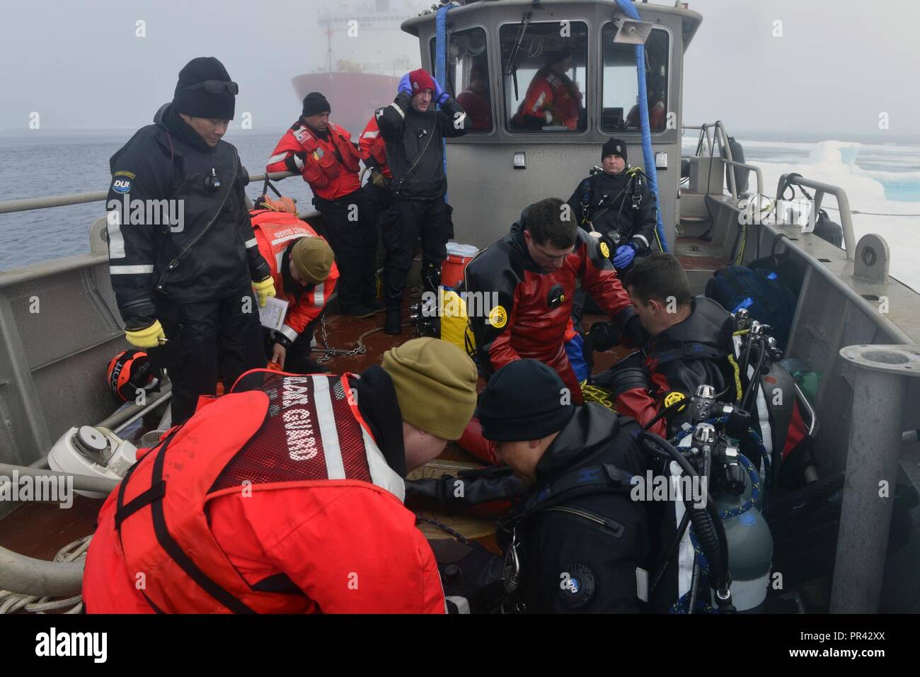 Joint coast guard navy dive team hi-res stock photography and images ...