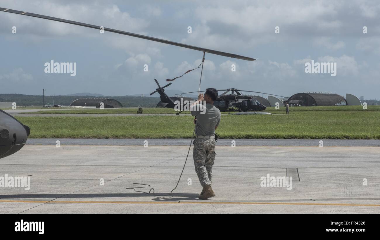 U.S. Army Aviation Battalion Japan Sgt. Reymark Racadio, UH-60 Black ...