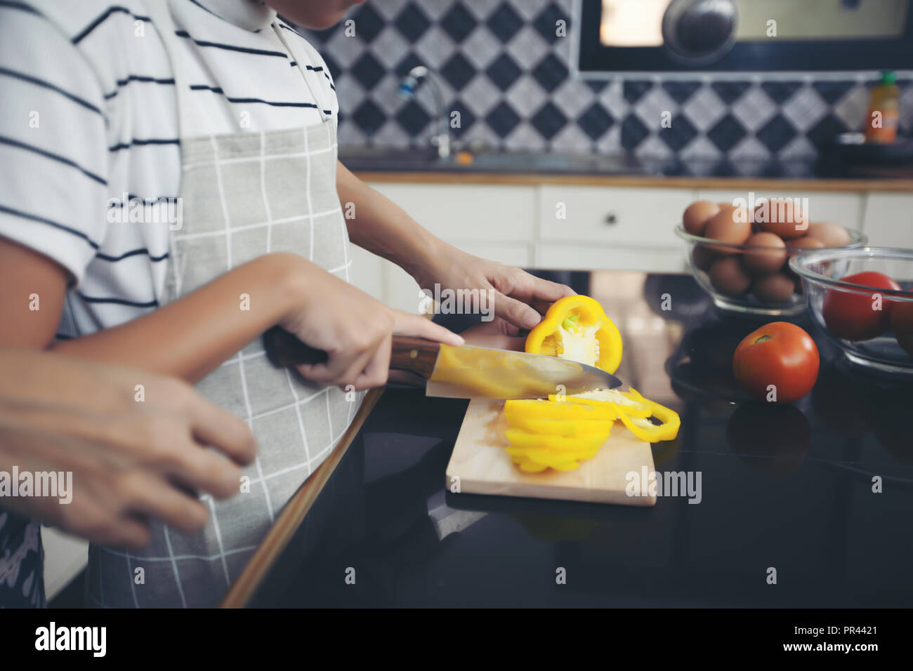 Happy Family have Dad, Mom and their little daughter Cooking Together ...