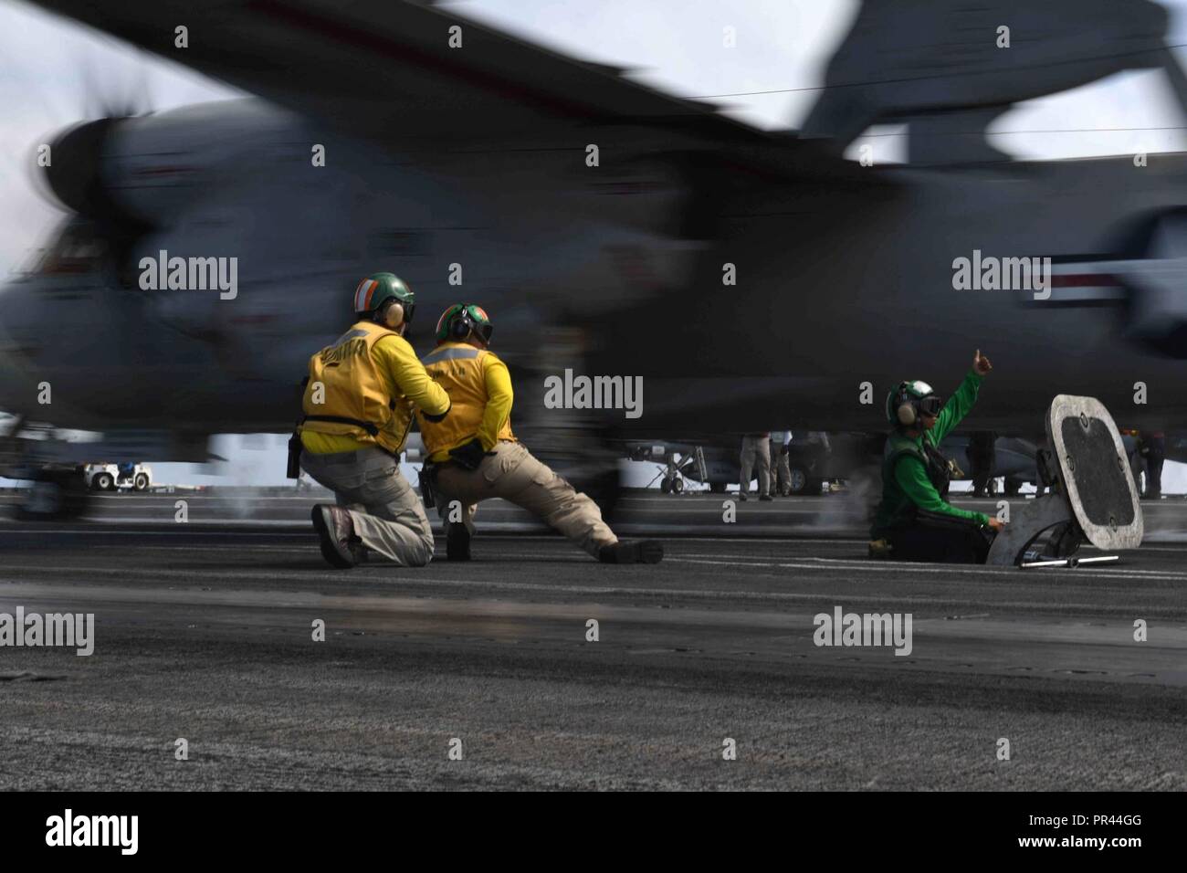ATLANTIC OCEAN (Sep. 5, 2018) Sailors observe as an E-2D Hawkeye ...