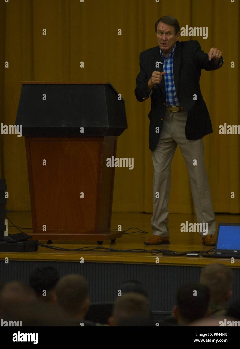 Phil Downer speaks to Marines and sailors Sept. 6, 2018, during a ...