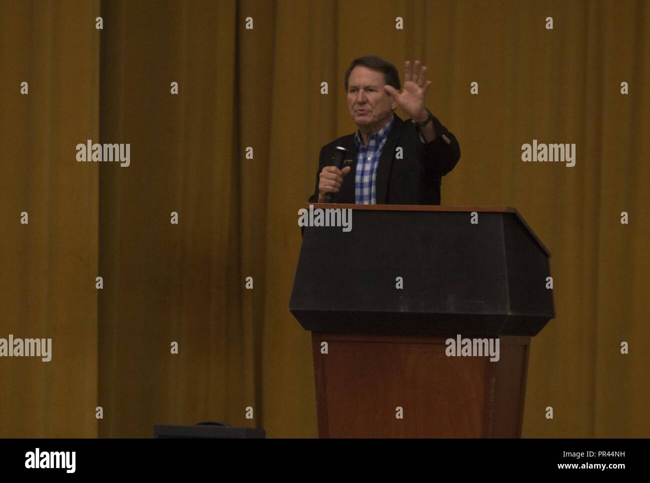 Phil Downer speaks to Marines and sailors Sept. 6, 2018, during a ...