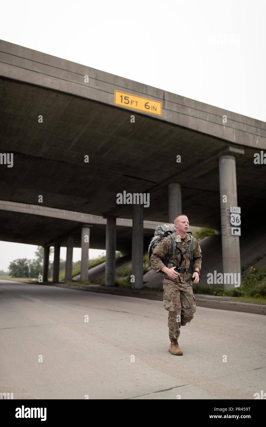 Servicemembers engage in a ruck march at Rosecrans National Air Guard ...