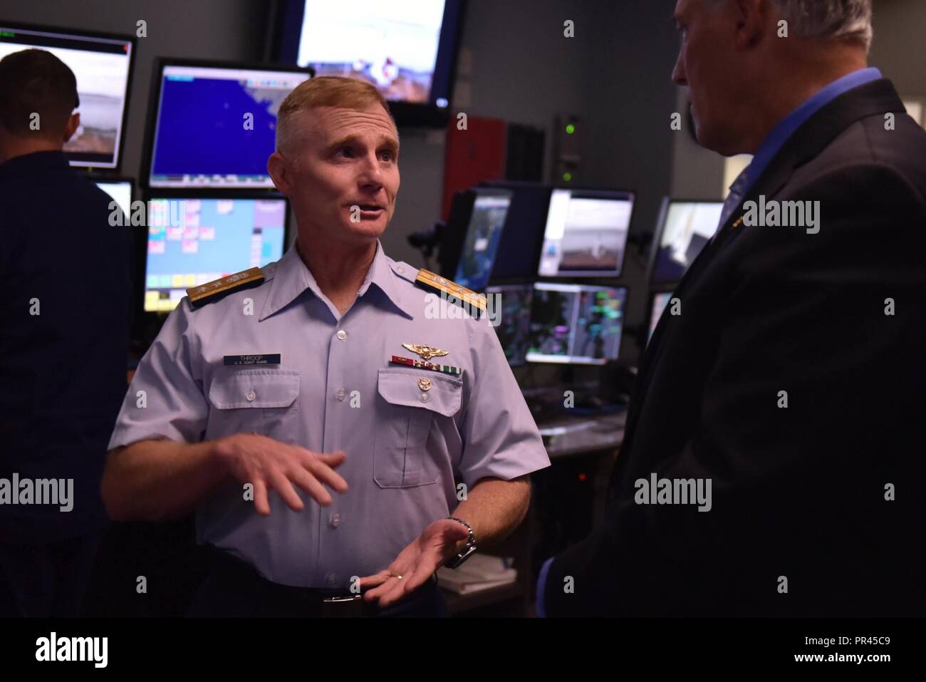 Rear Adm. David Throop, commander, Coast Guard 13th District, describes ...