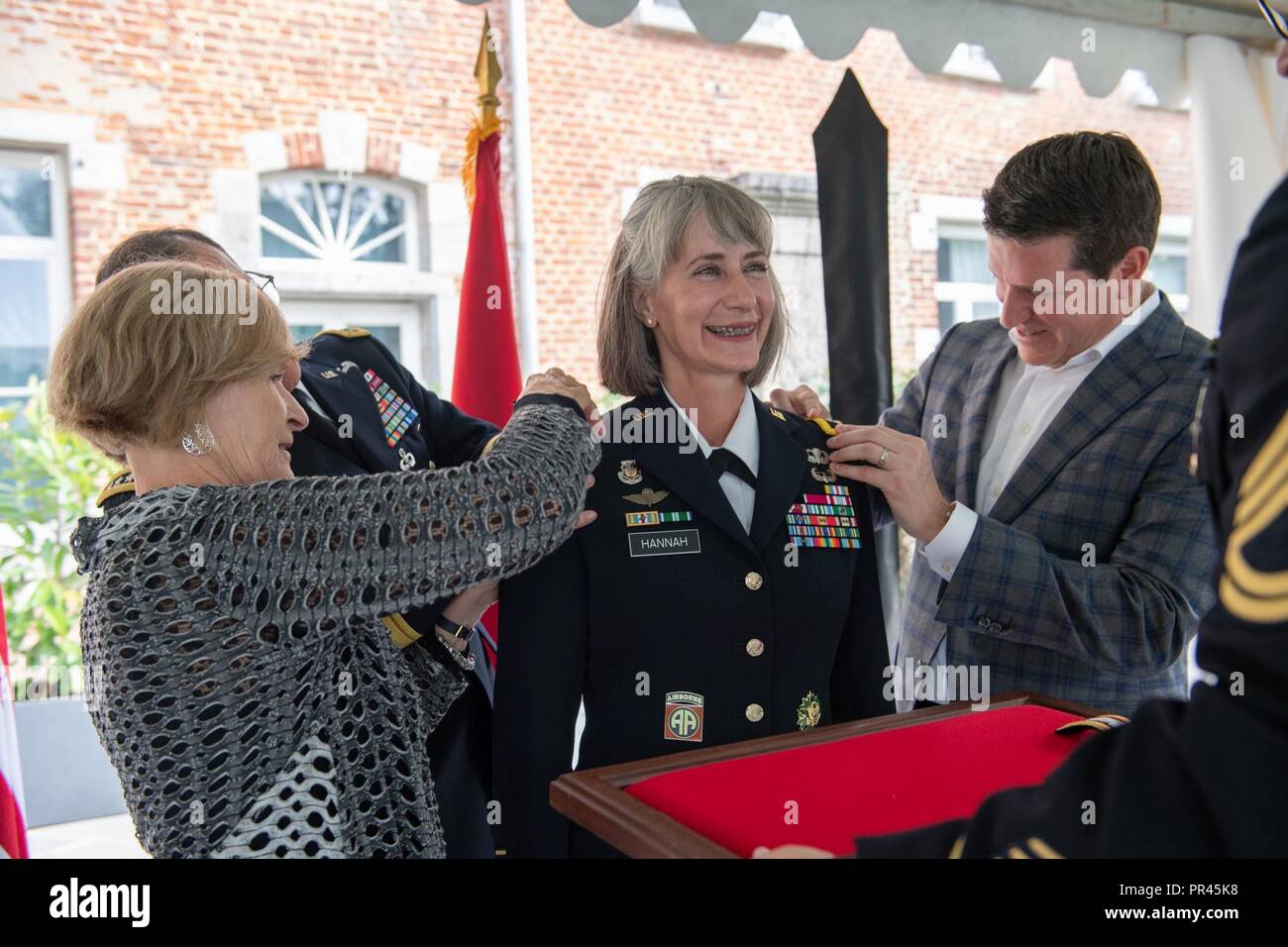 Brig. Gen. Amy Hannah, chief of SHAPE Public Affairs, accepts the rank ...