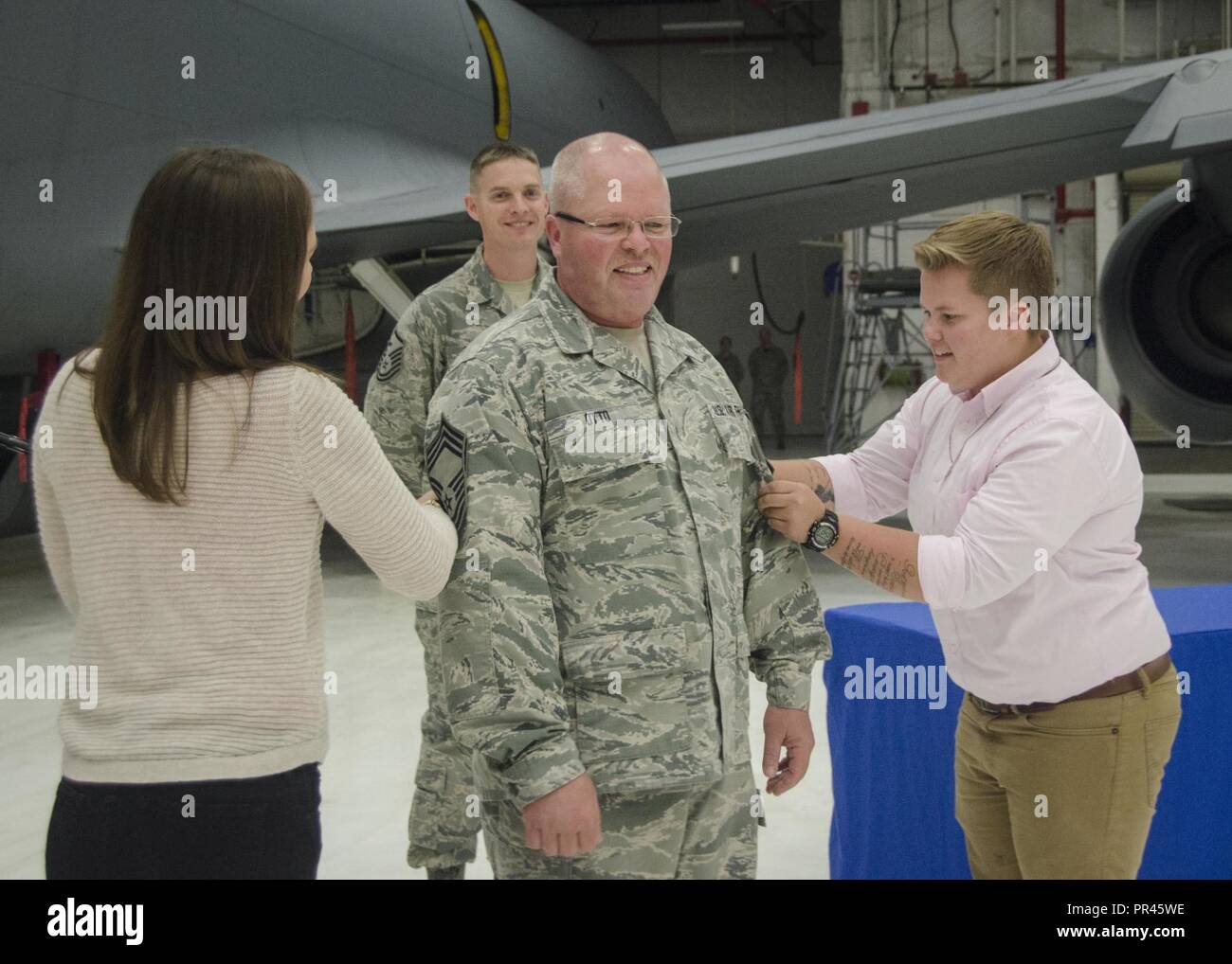Chief Master Sgt. Ross Otto has new chevrons tacked on by his children ...