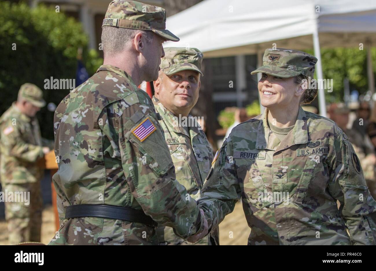 U.S. Army Col. Heather Reuter, right, the new commander of 2nd Brigade ...
