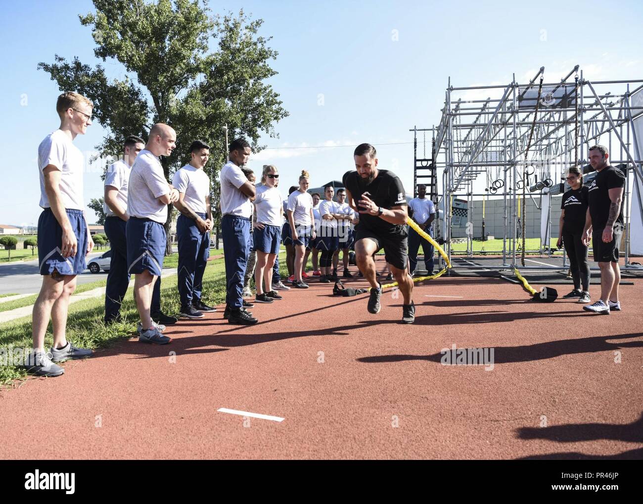 Chad Leath, Alpha Warrior fitness coach, demonstrates how to use a ...