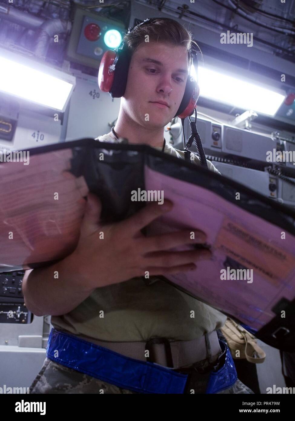 U.S. Air Force Staff Sgt. Troy Kennedy, a Regular Air Force crew chief ...