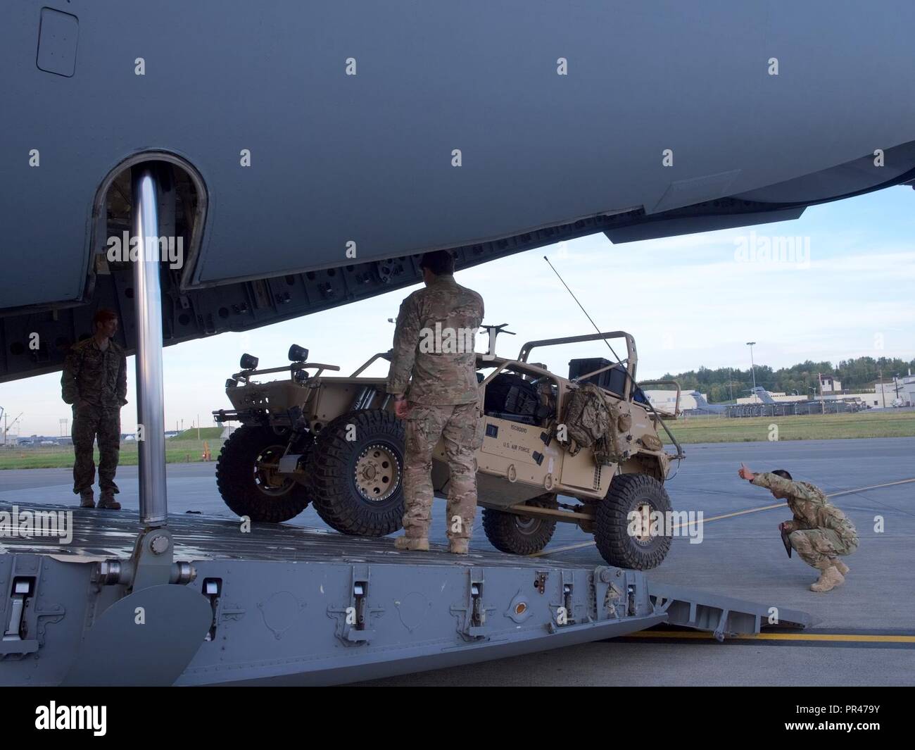 Alaska Air National Guard Airmen of 176th Wing load a Guardian Angel ...