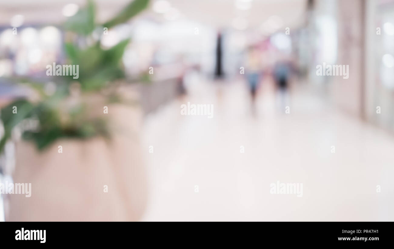 abstract shopping mall store blurred on background Stock Photo - Alamy