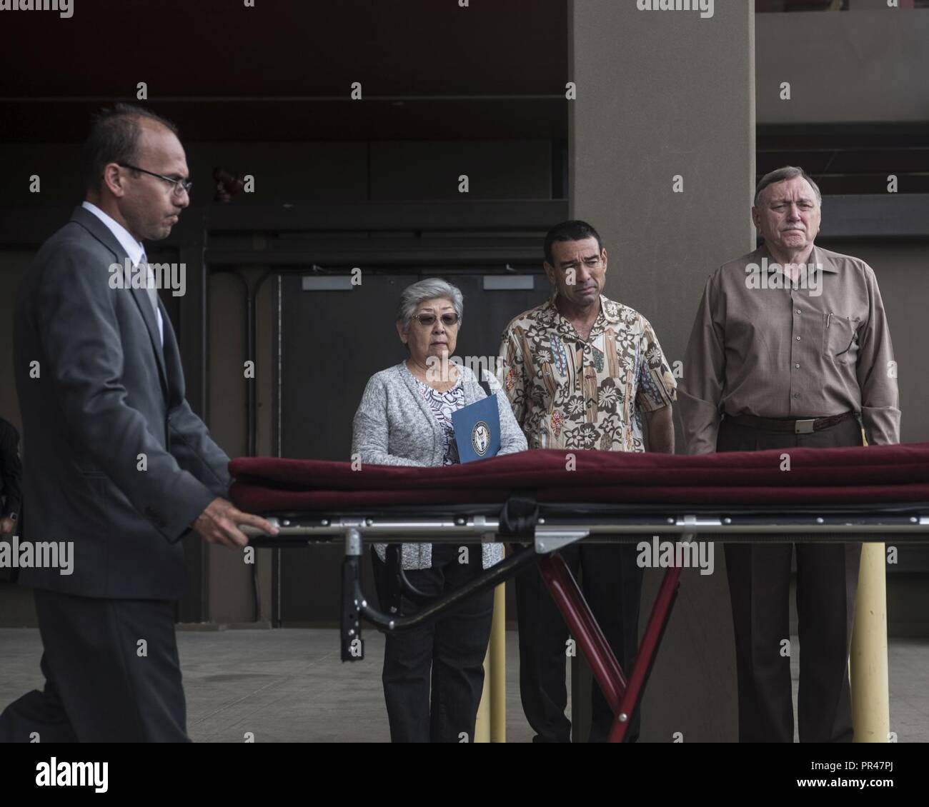 Amy and Eric House, wife and son of the late U.S. Marine Corps Capt ...