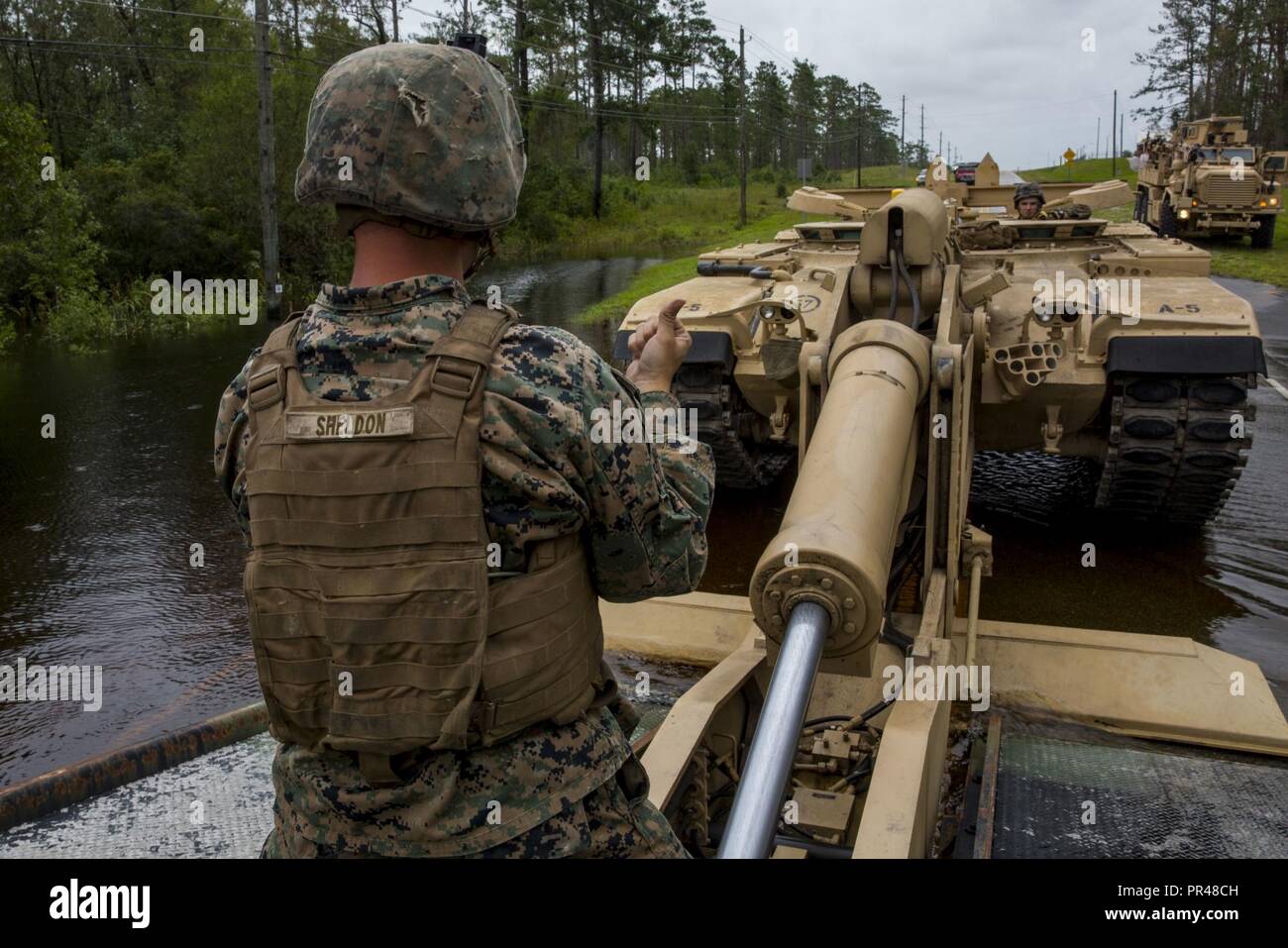 U.S. Marine Corps Cpl. Tyler J. Sheldon, left, combat engineer ...