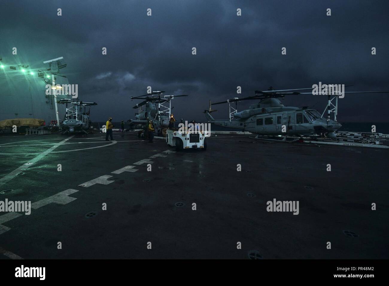 INDIAN OCEAN (Dec. 30, 2017) Sailors conduct flight deck operations on ...