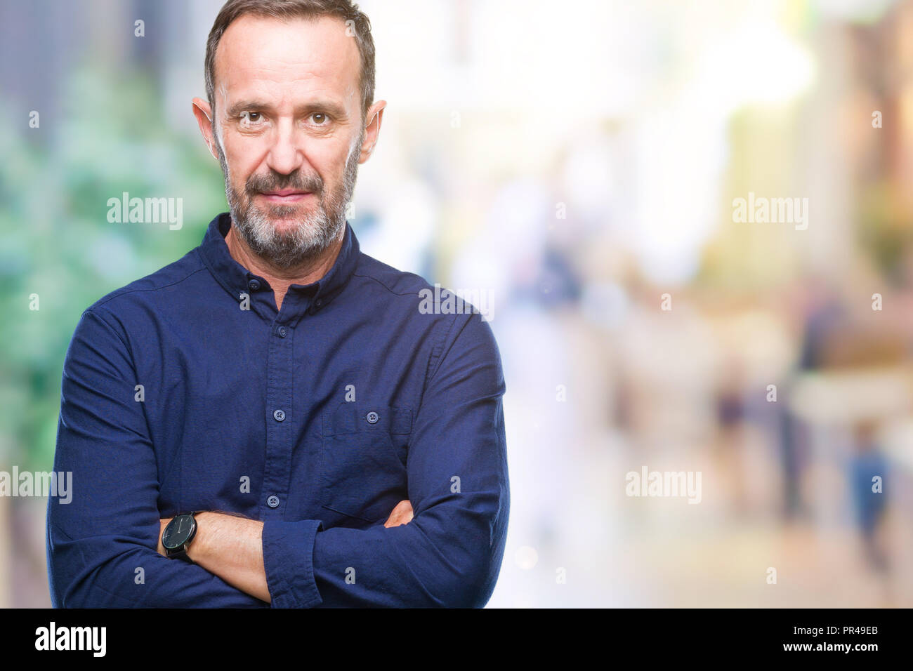 Middle age hoary senior man over isolated background with serious ...