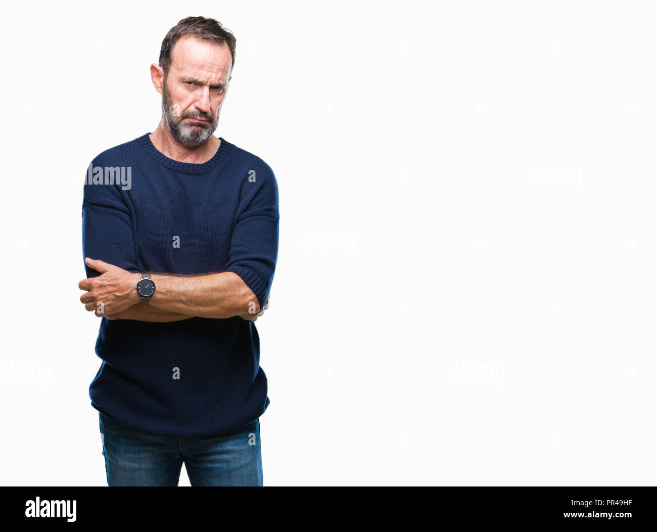 Middle age hoary senior man over isolated background skeptic and ...