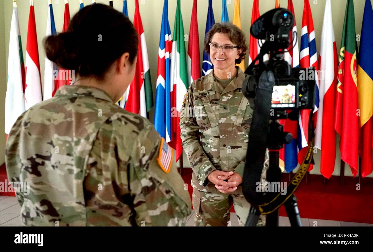 U.S. Army Brig. Gen. Kelly Fisher conducts an interview during her ...