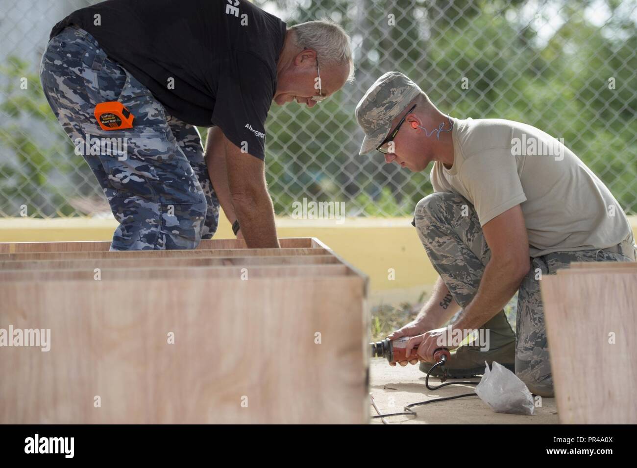 Australian Leading Aircraftsman Robert Hunt (left), a carpenter with ...