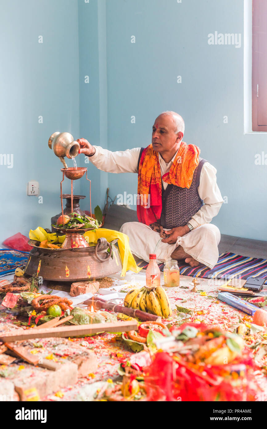kathmandu,Nepal - Mar 10,2018: A Hindu Prayer Putting Holy Water on a ...