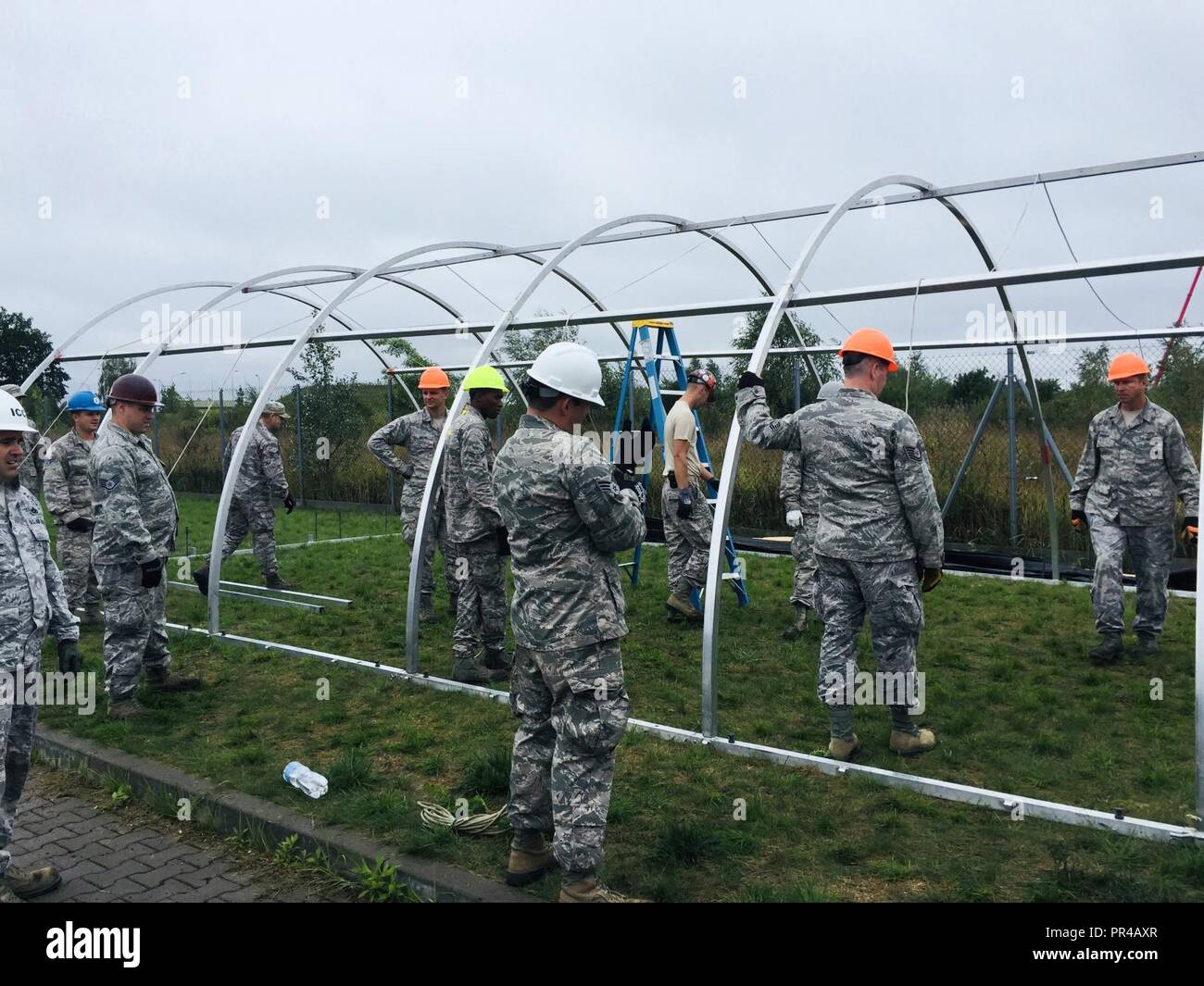 Airmen work together to setup tent city during the Deployable Air Base ...