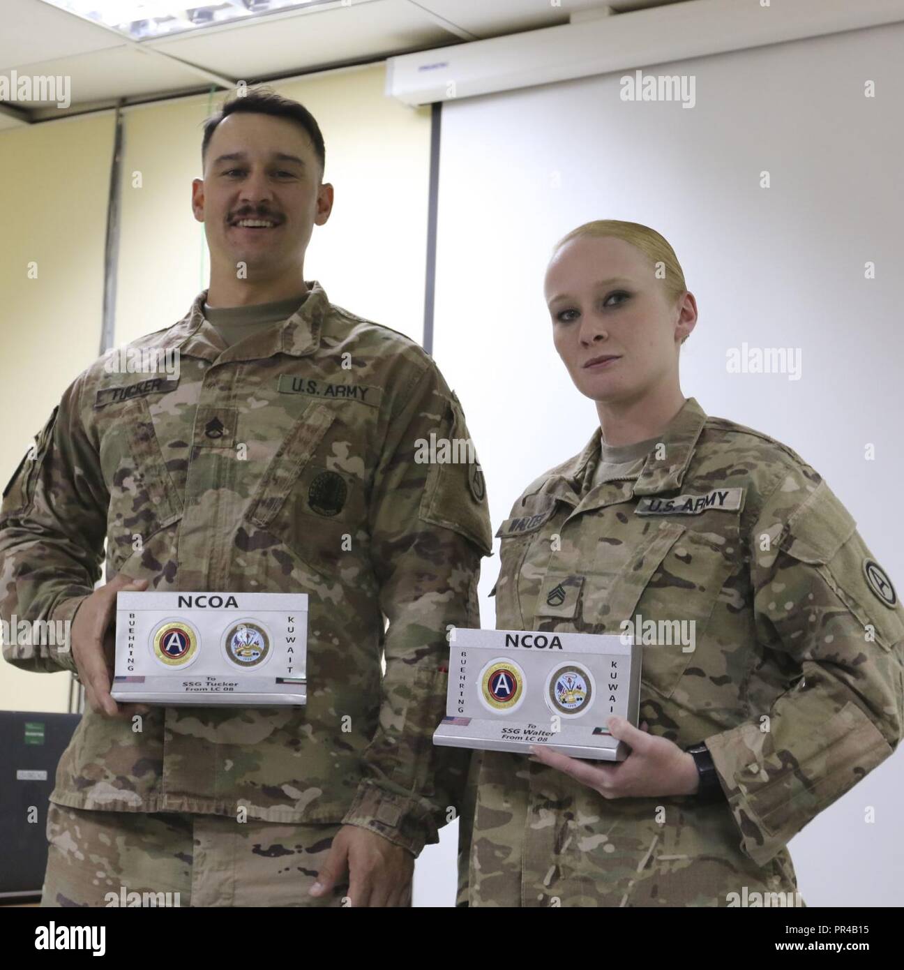 U.S. Army Soldiers graduating from the Basic Leader Course recognize ...