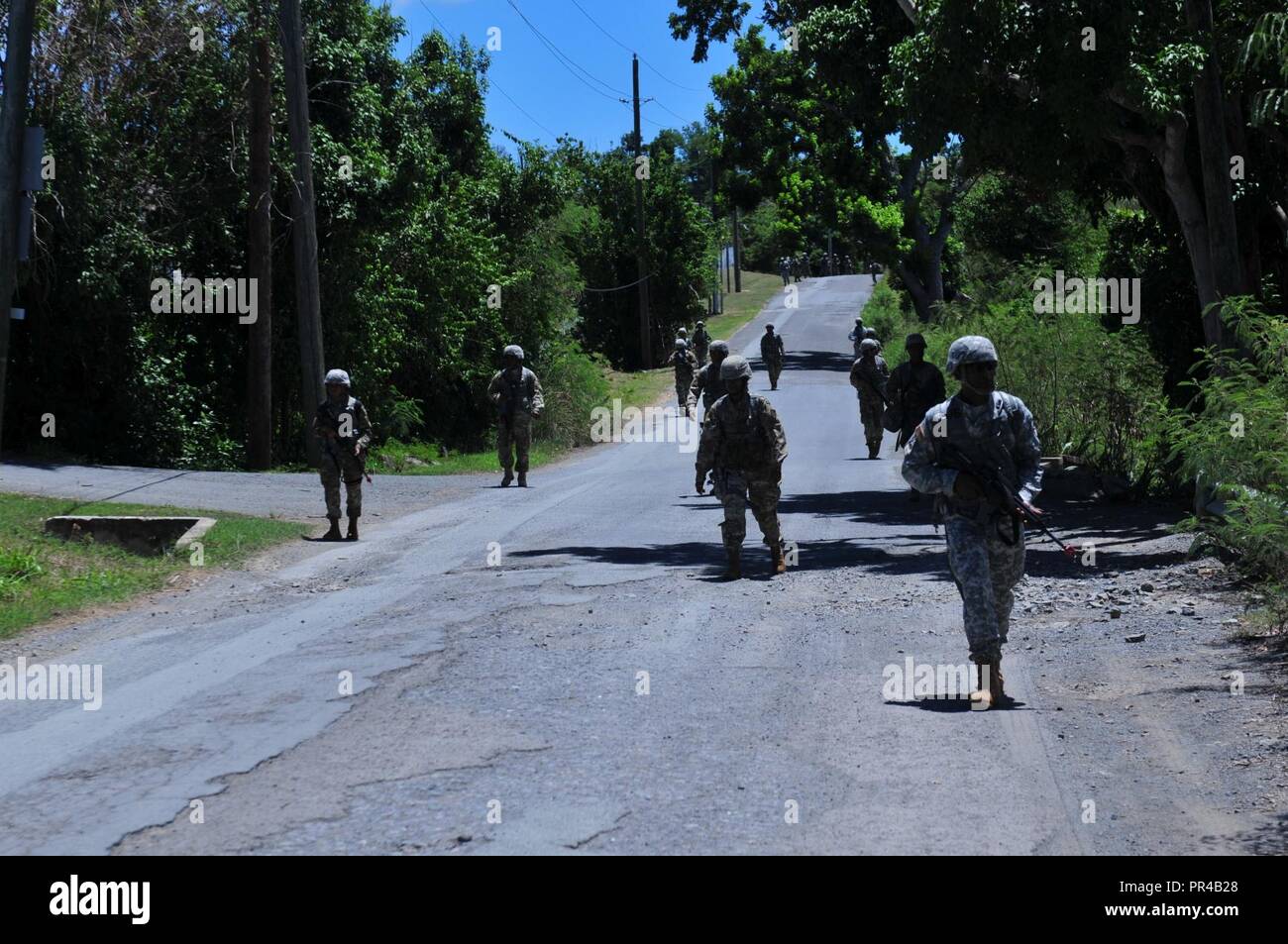 Soldiers from the Virgin Islands National Guard gear up to get ready ...