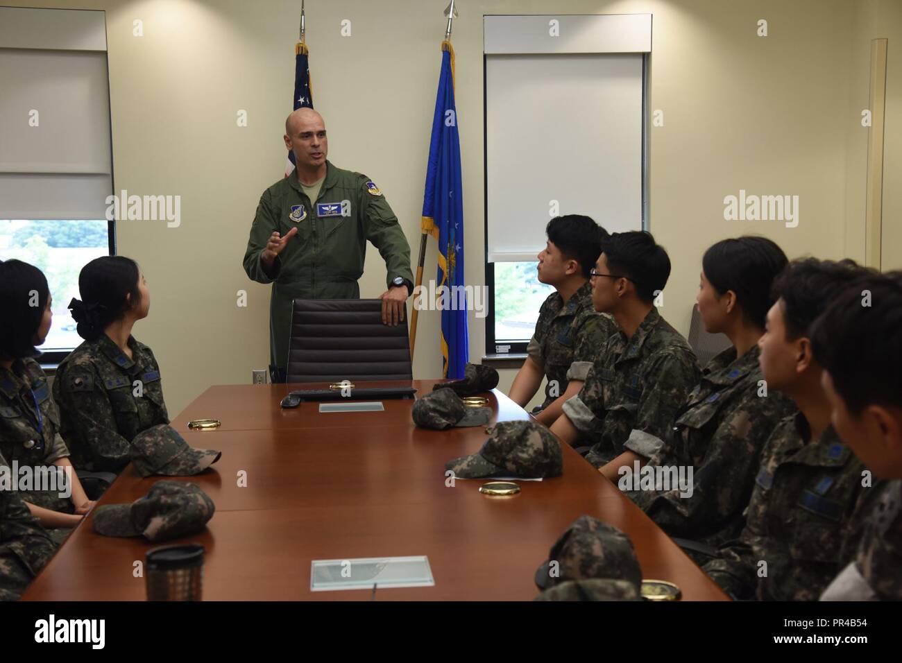 U.S. Air Force Col. Victor Ortiz, center, 51st Medical Group deputy ...