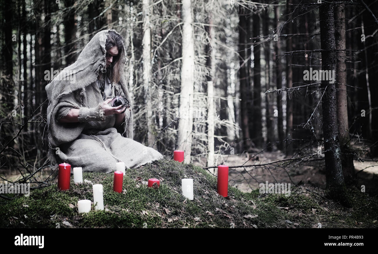 Fairy magician. A sorcerer with a glass sphere, a magical spell Stock ...