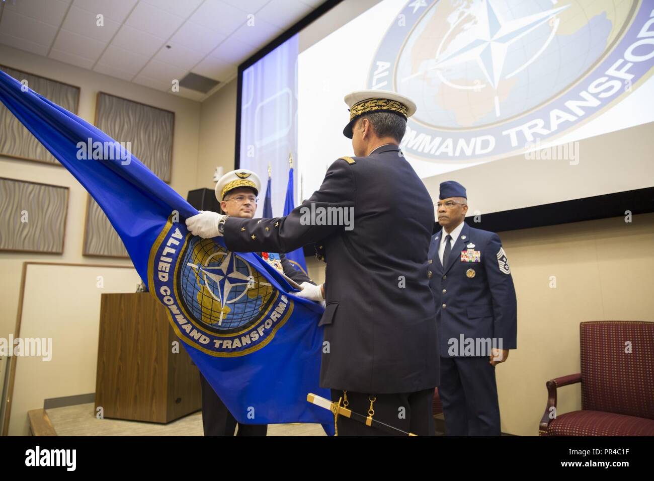French Air Force General Denis Mercier hands the over the NATO Allied ...
