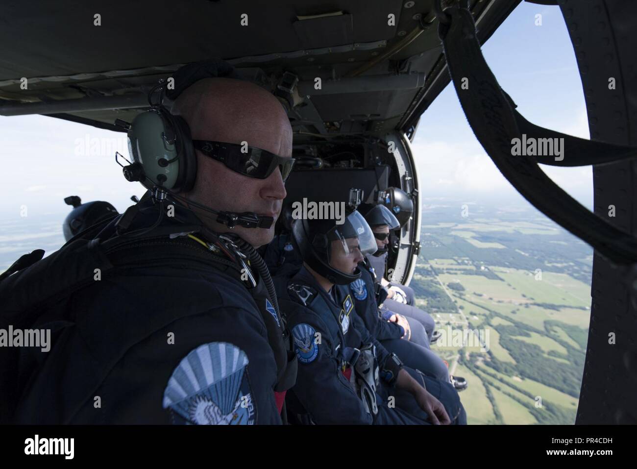 Members of the US Air Force Parachute Team, the Wings of Blue, perform ...