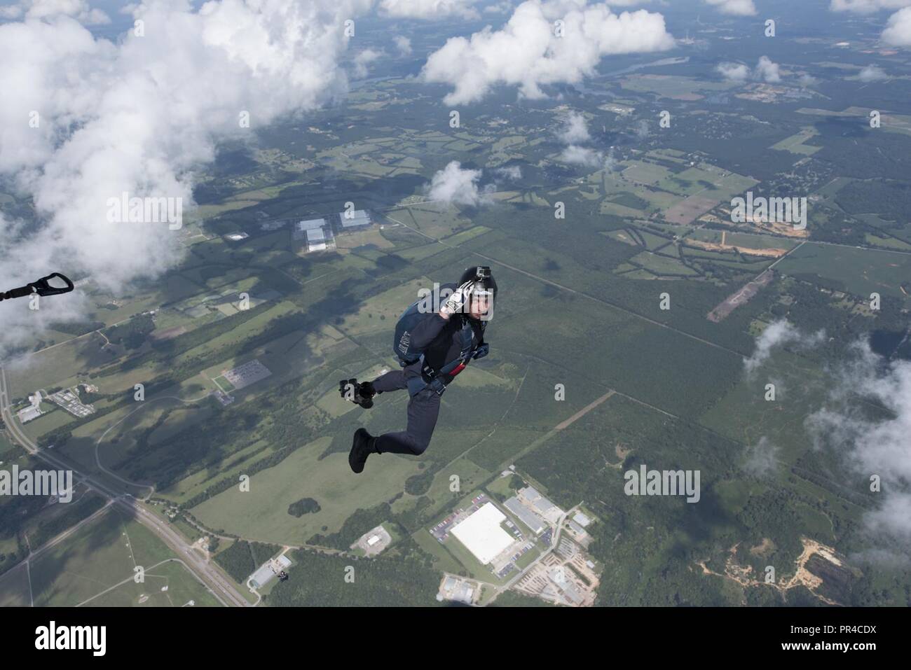 Members of the US Air Force Parachute Team, the Wings of Blue, perform ...