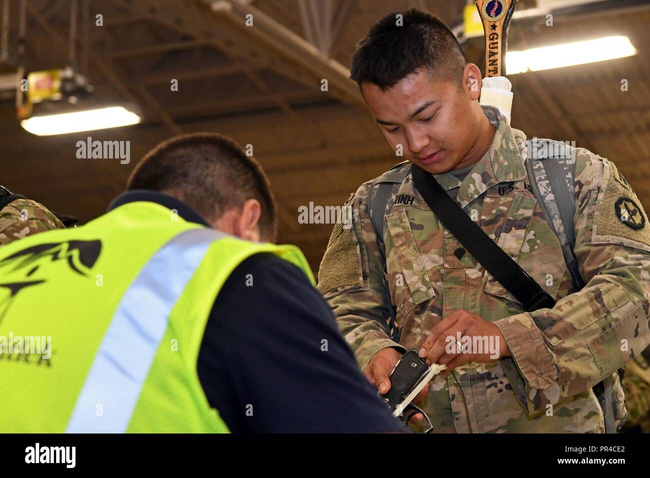 Spc. Tien T. Trinh, 320th Military Police Battalion, Ashley, Penn ...