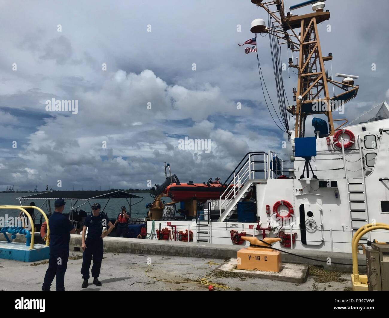 The crews of Coast Guard Cutter Washington (WPB 1331) and Coast Guard ...